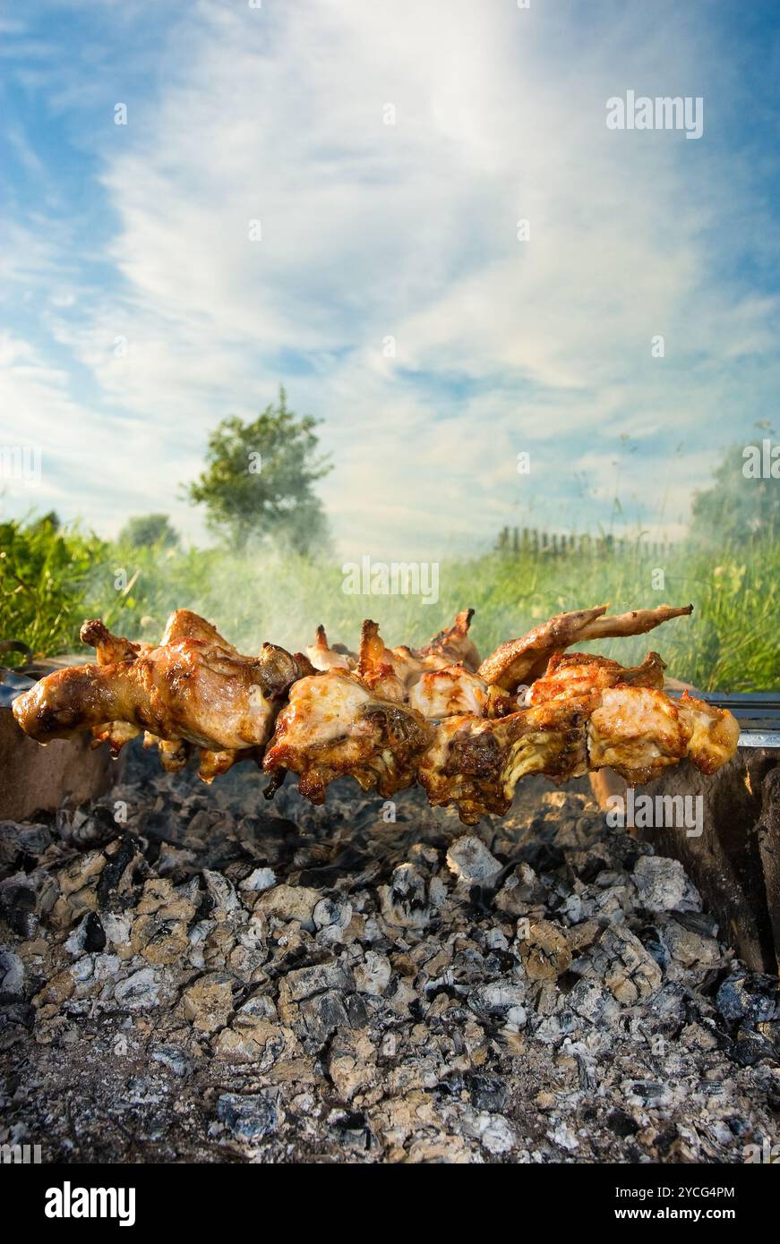 Shish kebab on the improvised oven made of brick Stock Photo - Alamy