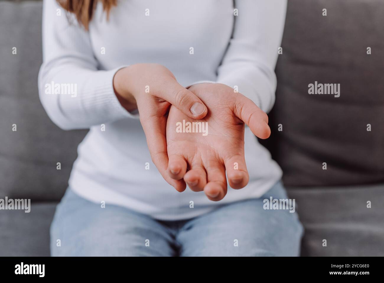 Chronic disease from injury. Rheumatism woman hand pain from cramp ...