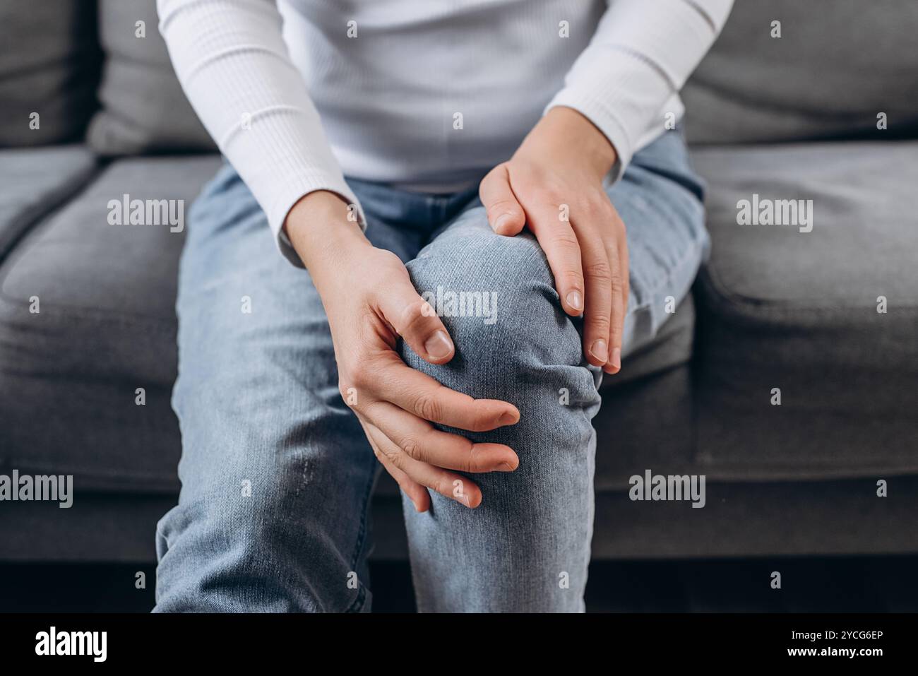 Young woman suffering on leg, pain knee from disease chronic, hand ...
