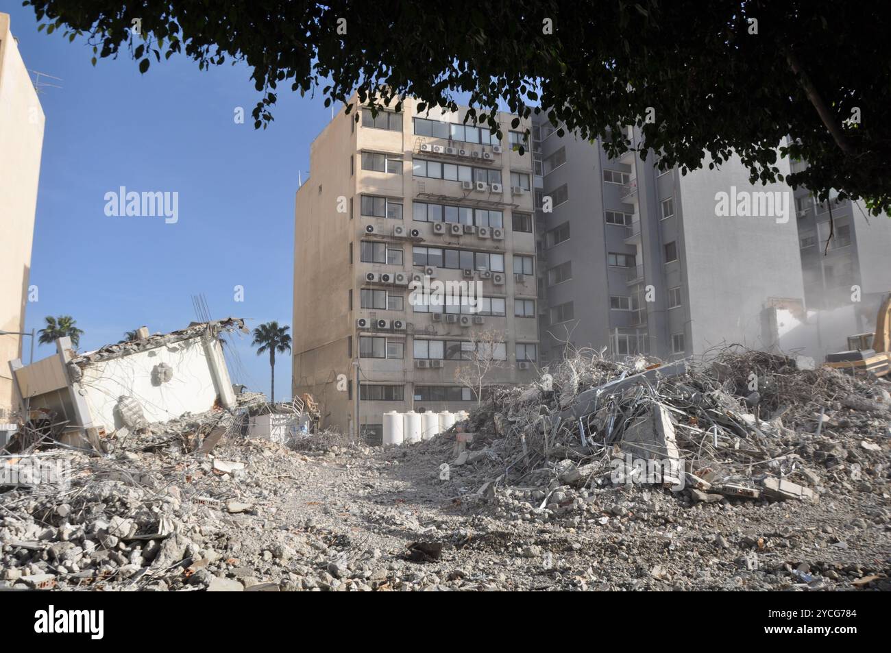 Excavators at Building Demolition Site with Rubble and Debris Stock ...