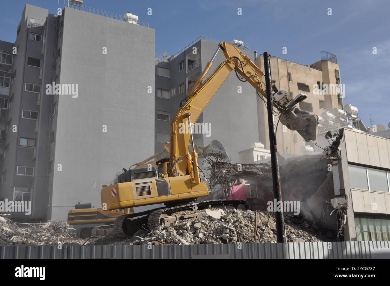Excavators at Building Demolition Site with Rubble and Debris Stock ...