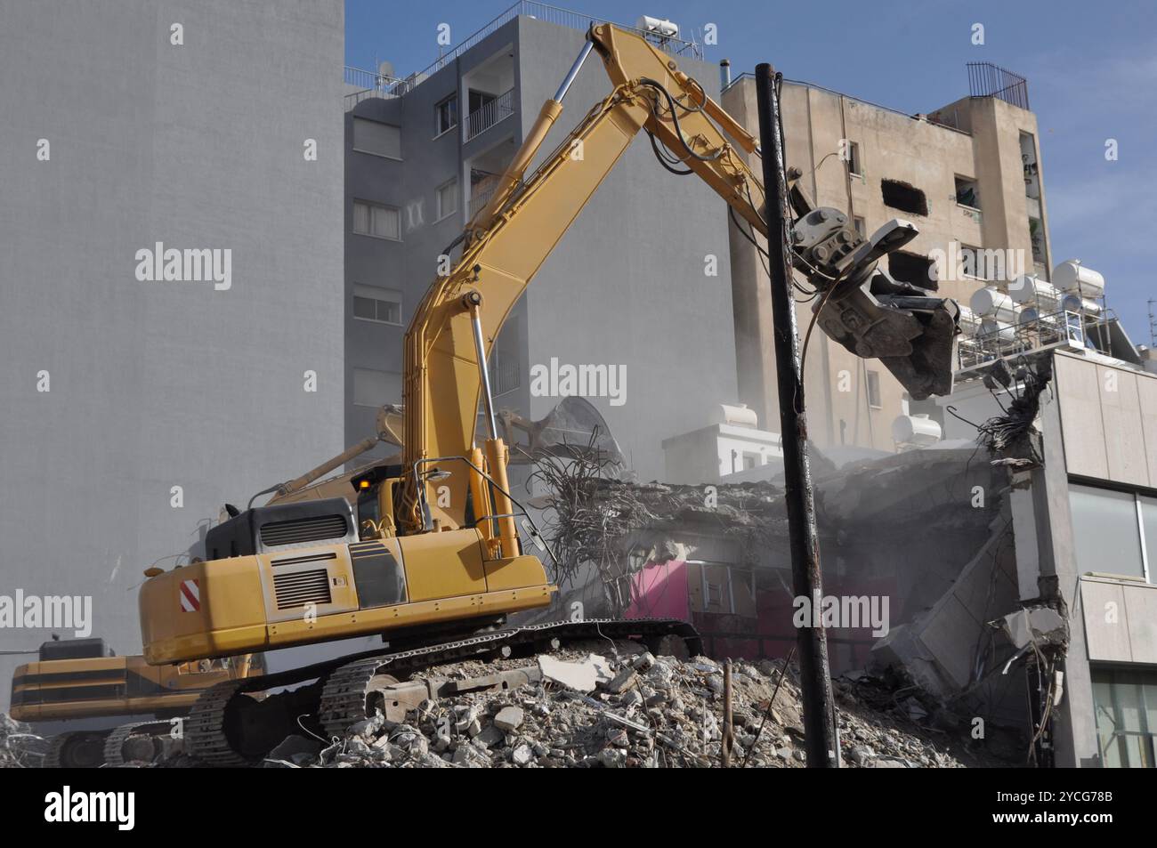 Excavators at Building Demolition Site with Rubble and Debris Stock ...