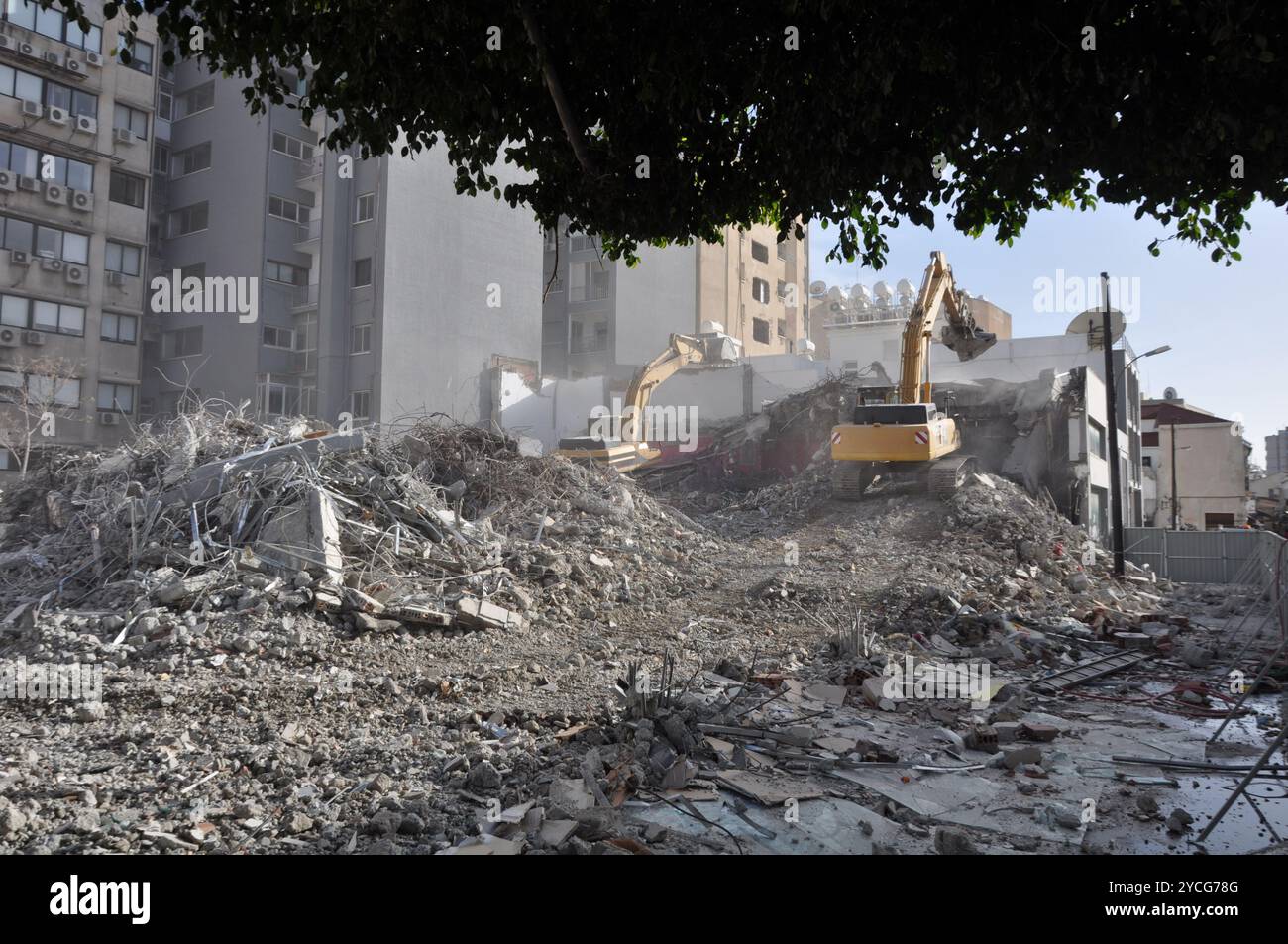 Excavators at Building Demolition Site with Rubble and Debris Stock ...