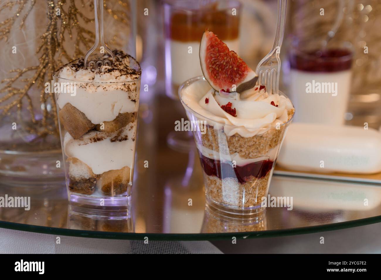 Exquisite Dessert Display Featuring Layered Parfaits and Cupcakes Stock ...