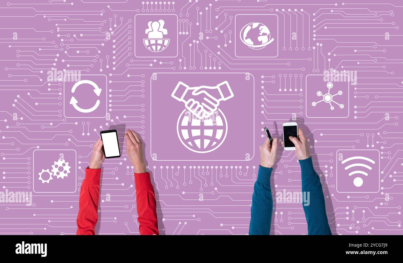 Top view of hands using mobile phone with symbol of globalization ...