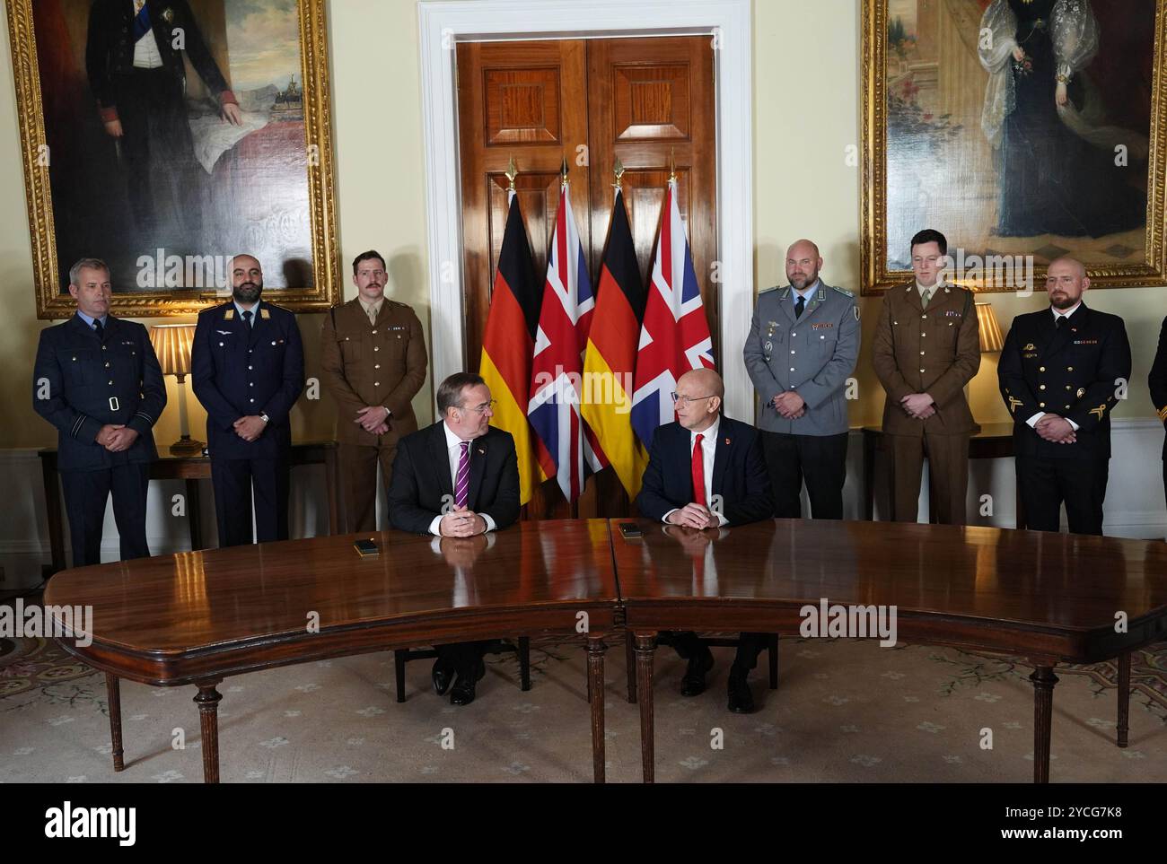 Defence Secretary John Healey (centre right) and his German counterpart ...
