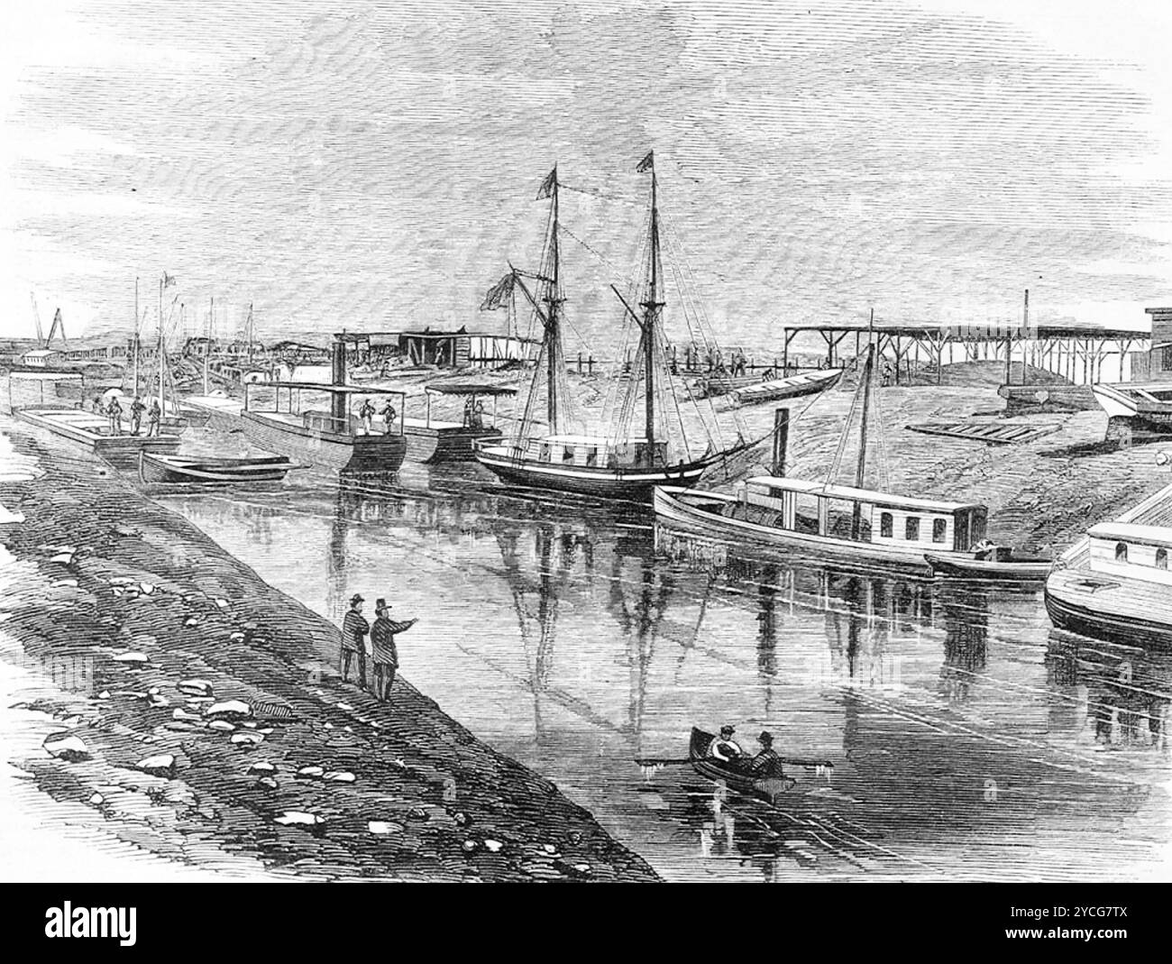OPENING OF THE SUEZ CANAL An 1869 engraving showing the first two ships ...