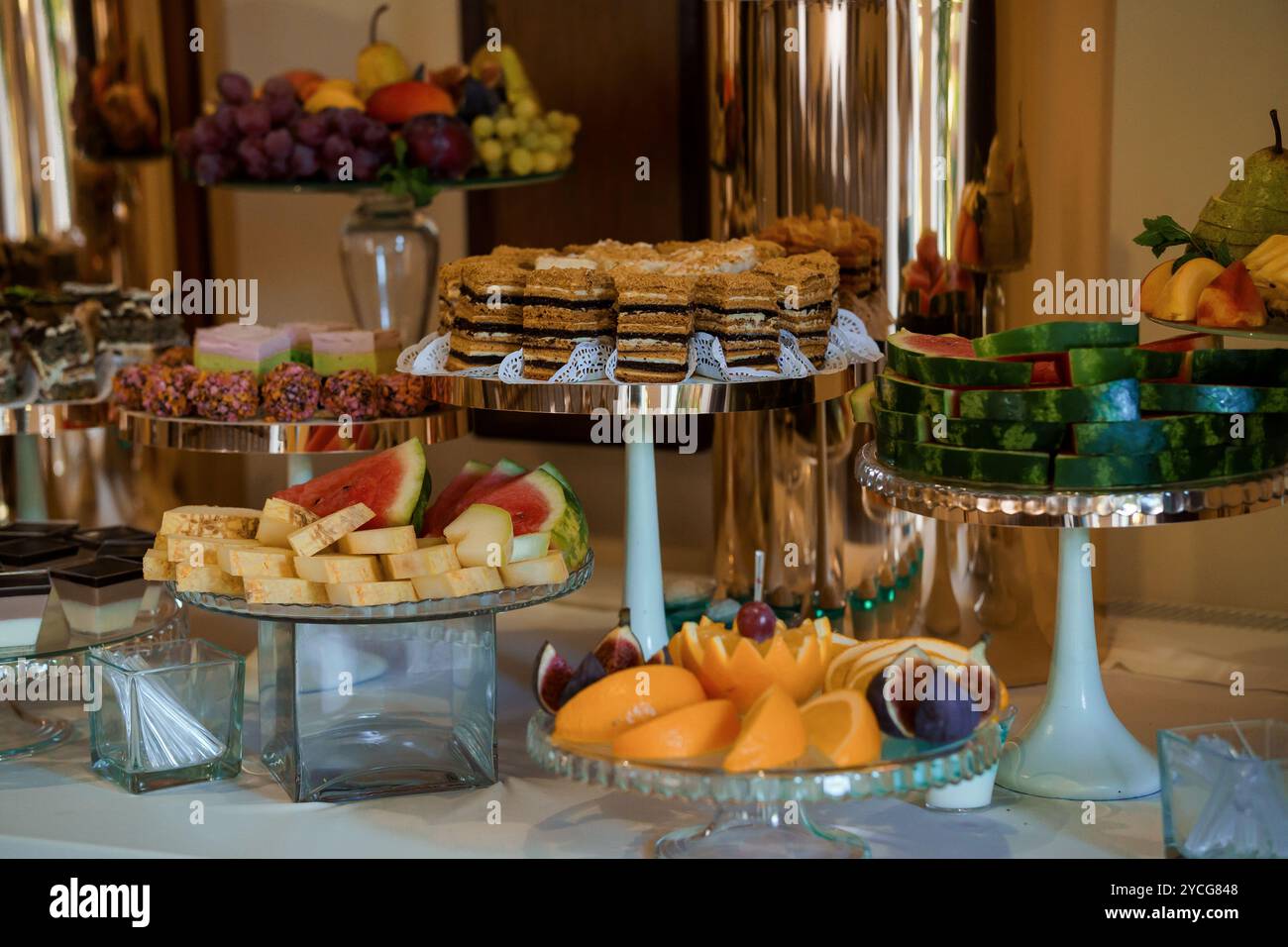 Exquisite Display of Colorful Desserts and Fresh Fruits at a Luxurious Buffet Stock Photo - Alamy