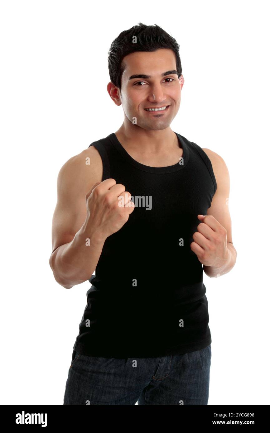 Adult male holding up two fists and smiling Stock Photo - Alamy