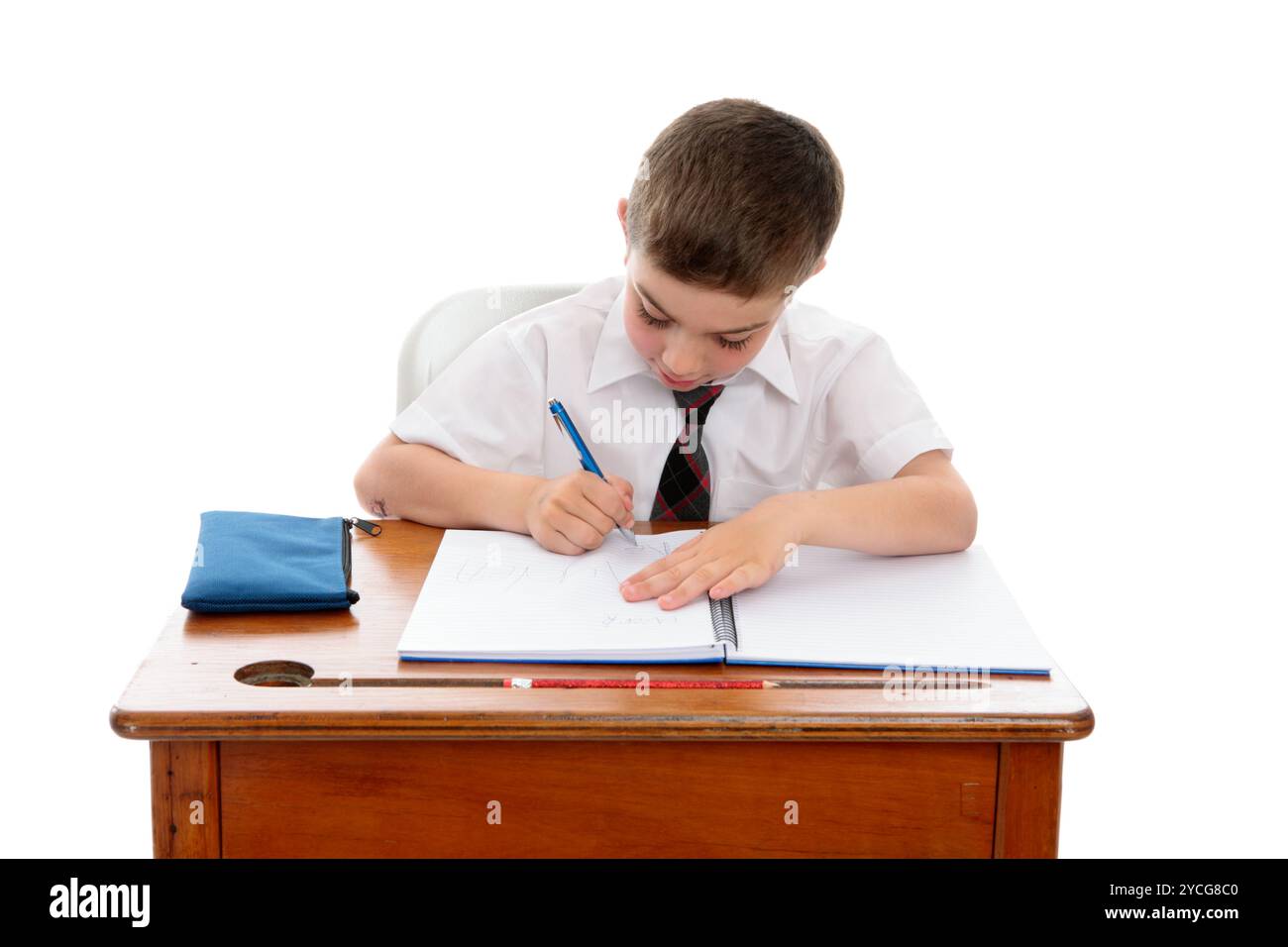 Little boy doing school work or homework Stock Photo - Alamy