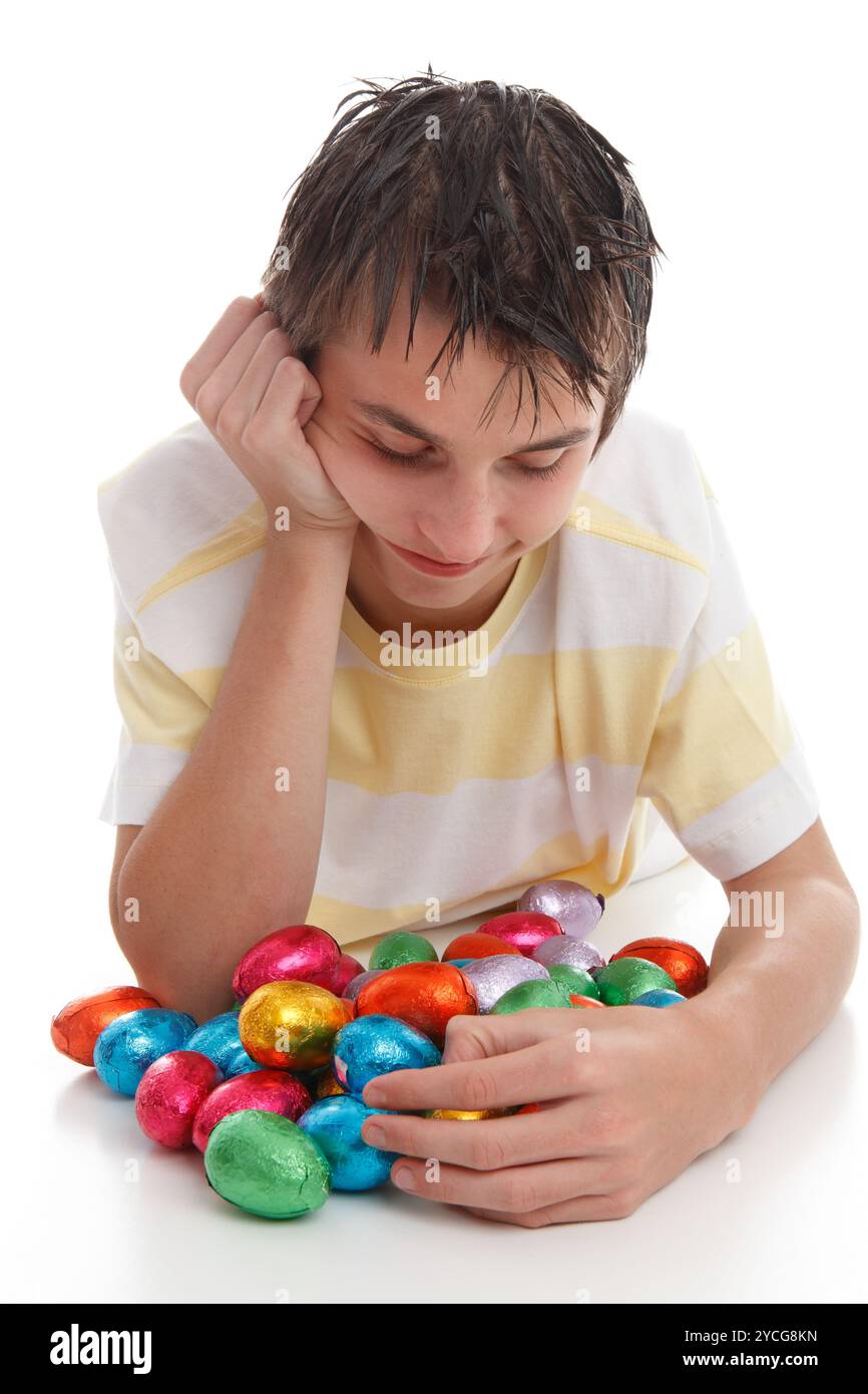 Boy with lots of easter eggs Stock Photo - Alamy