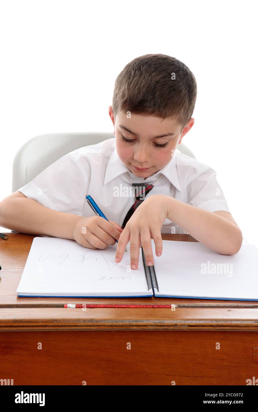Studious boy doing school work Stock Photo - Alamy