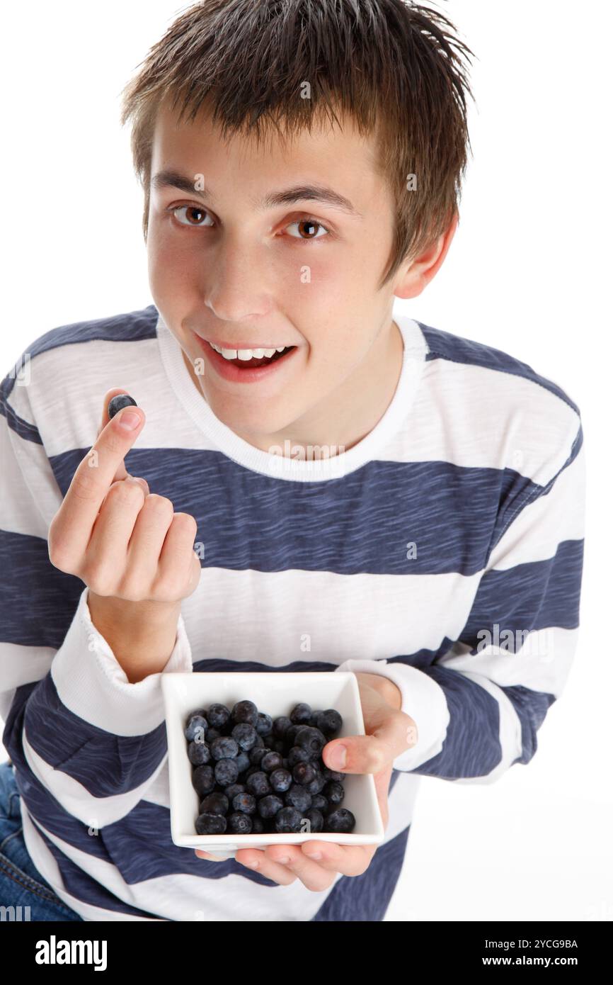 Healthy life - eating blueberries Stock Photo - Alamy
