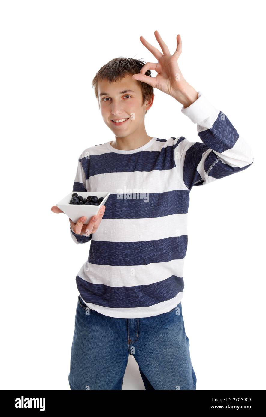 Healthy Eating - boy holding blueberries Stock Photo - Alamy