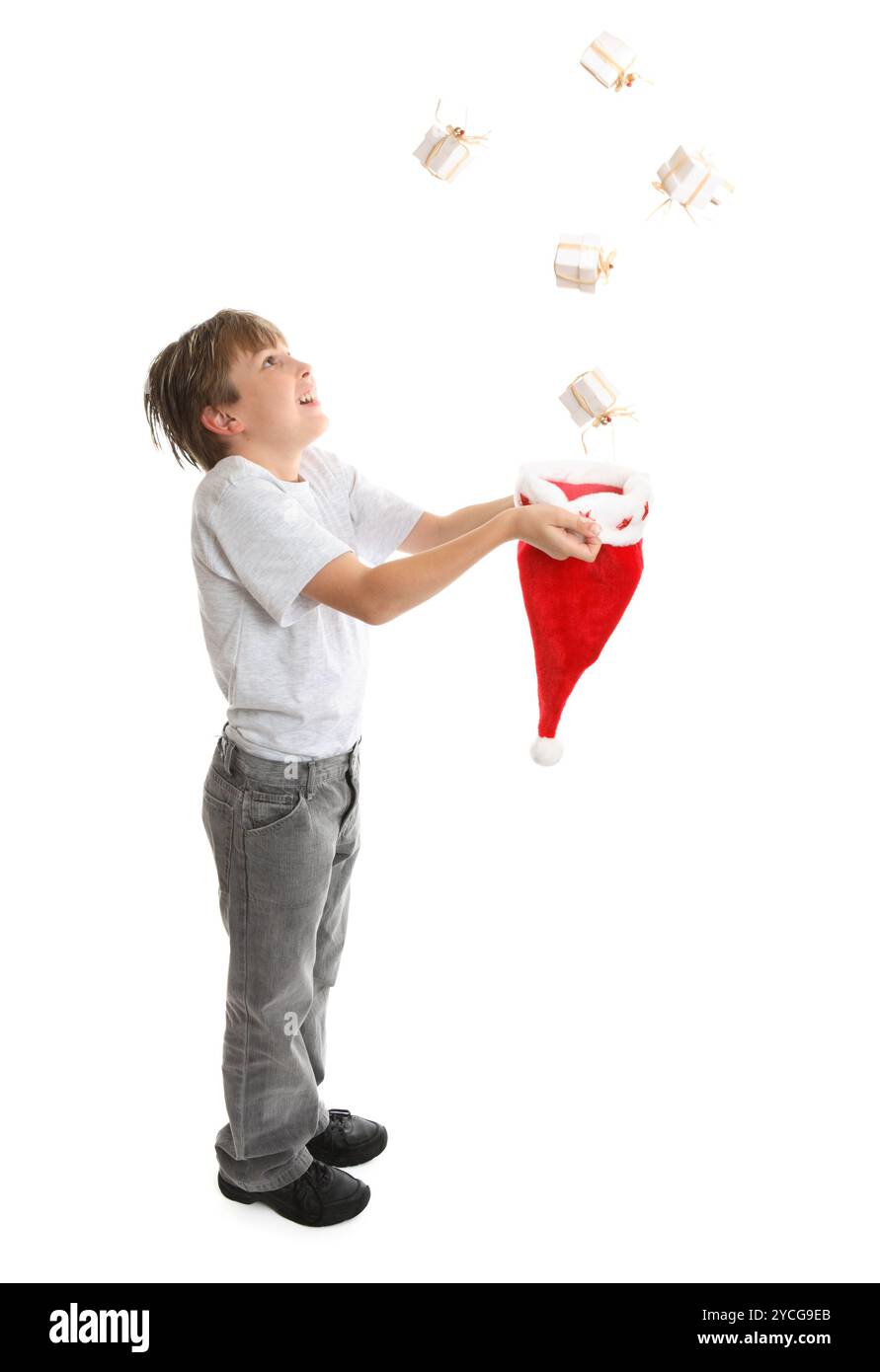 Boy catching presents Stock Photo - Alamy
