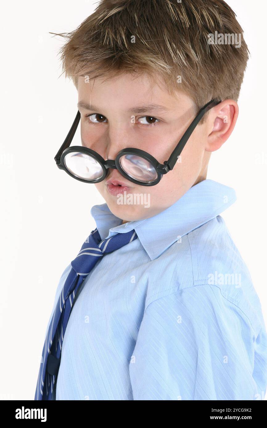 Child looking over the top of round glasses Stock Photo - Alamy