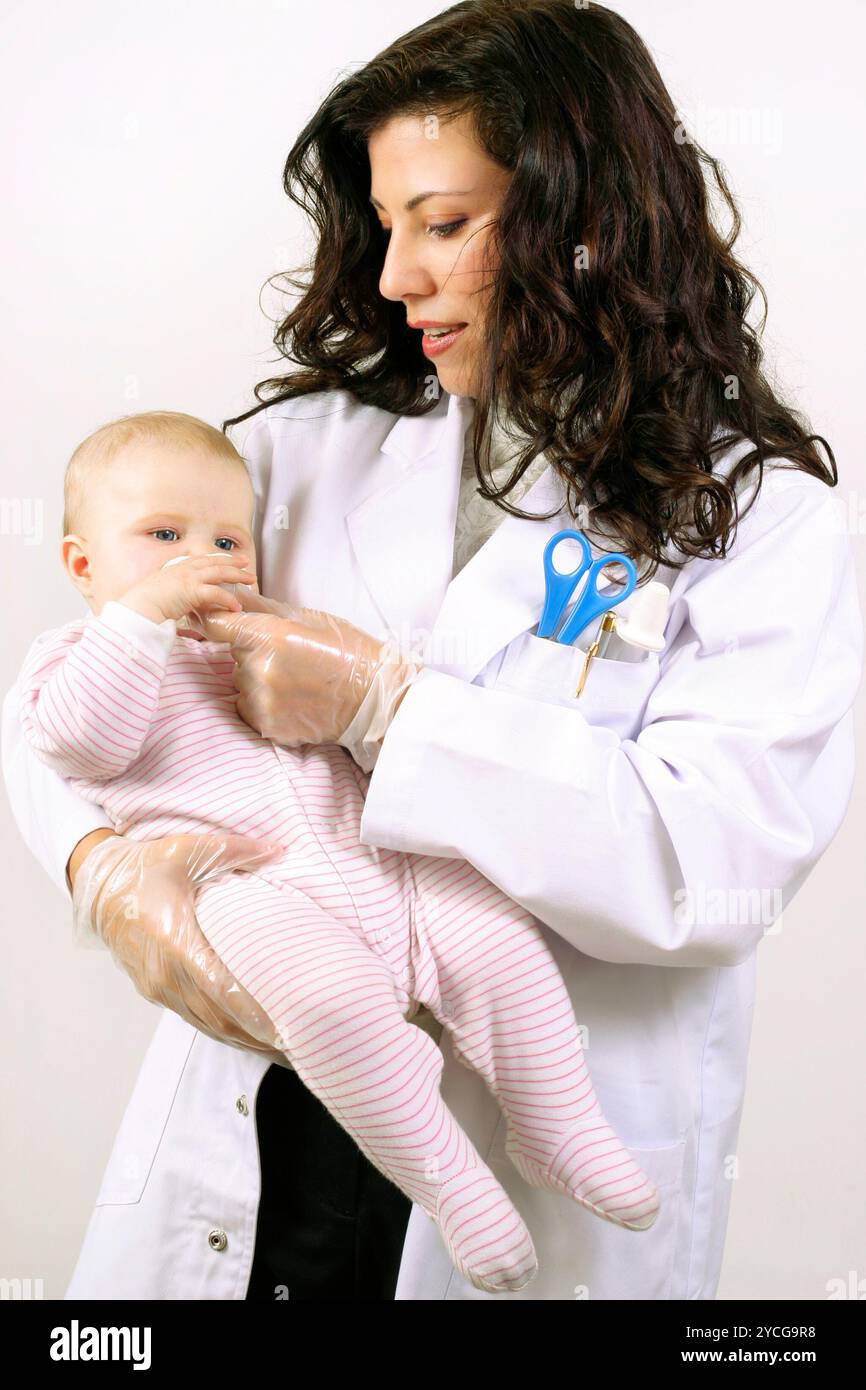 Nurse caring newborn child hi-res stock photography and images - Alamy