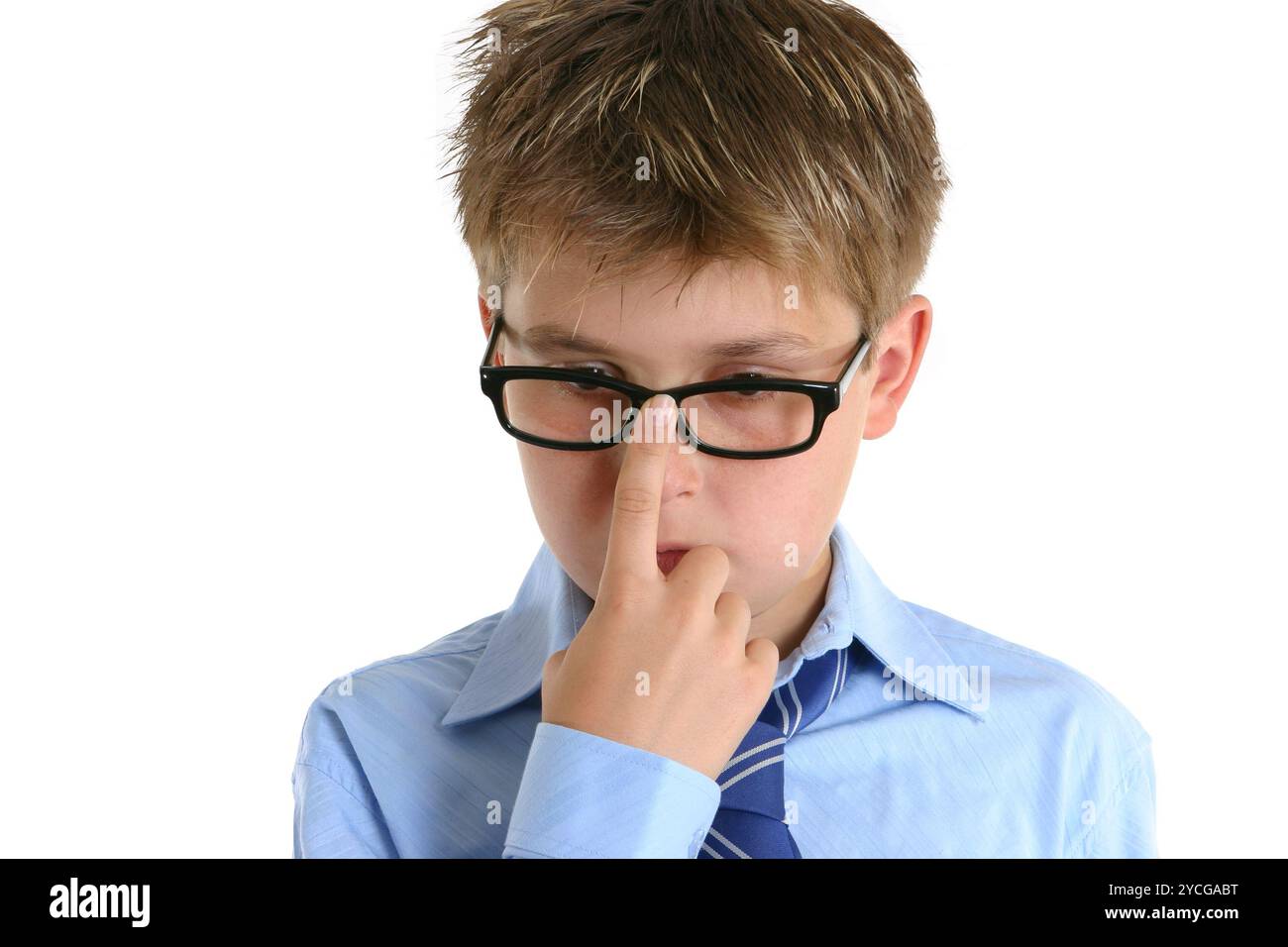 School boy child pushing glasses up onto nose Stock Photo - Alamy