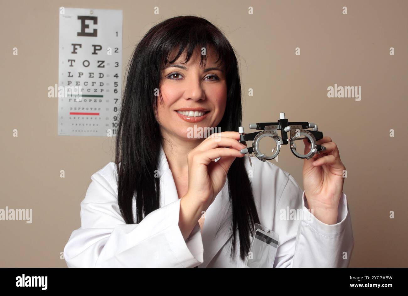 Smiling woman frames eyes hi-res stock photography and images - Alamy