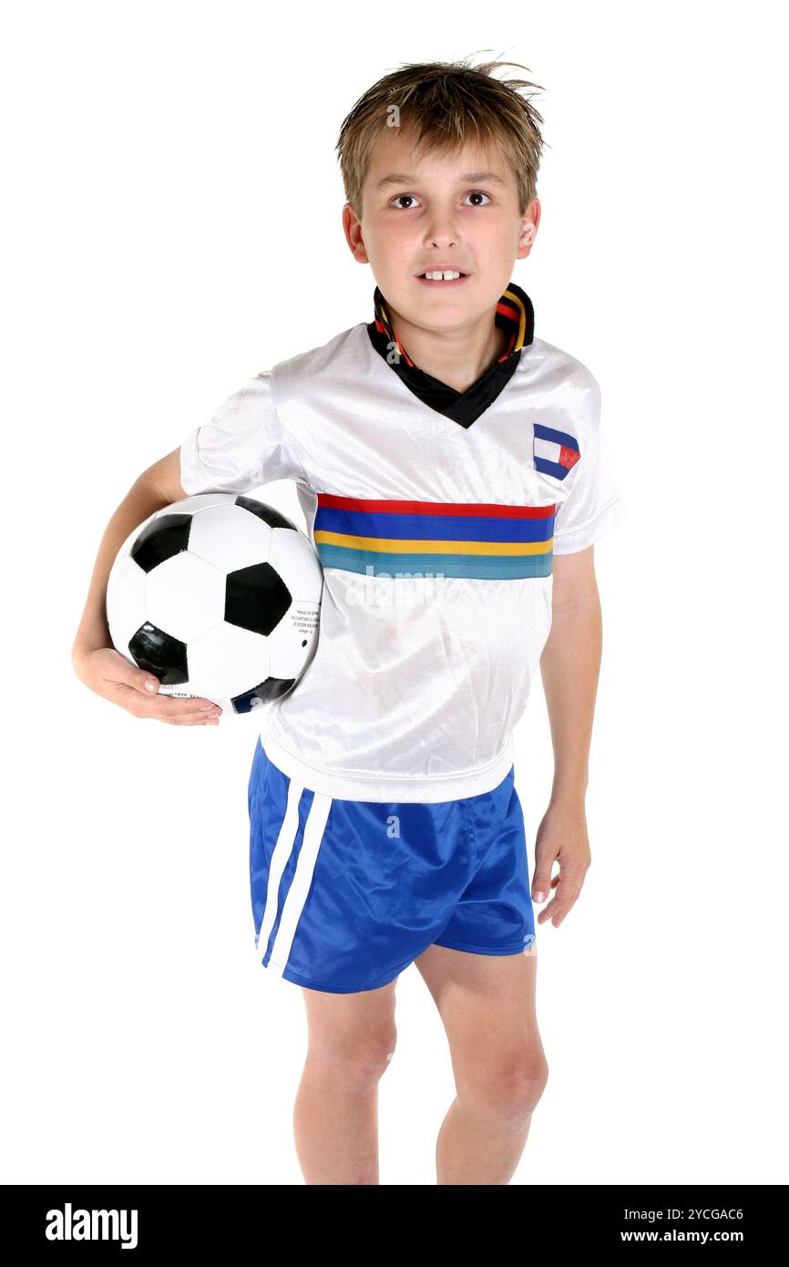 Holding soccer ball boy Cut Out Stock Images & Pictures - Alamy