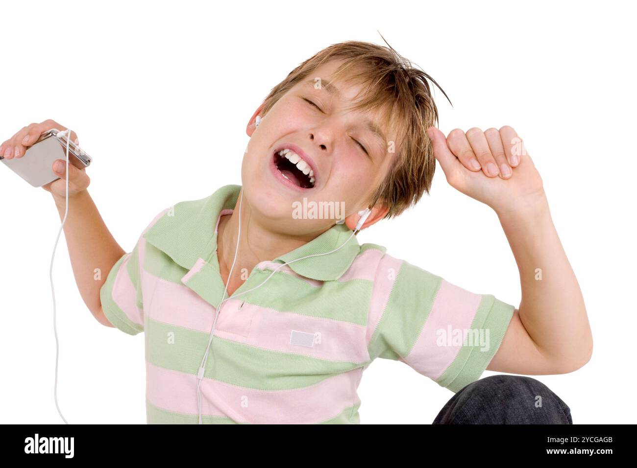 A child enjoying music on an mp3 player Stock Photo - Alamy