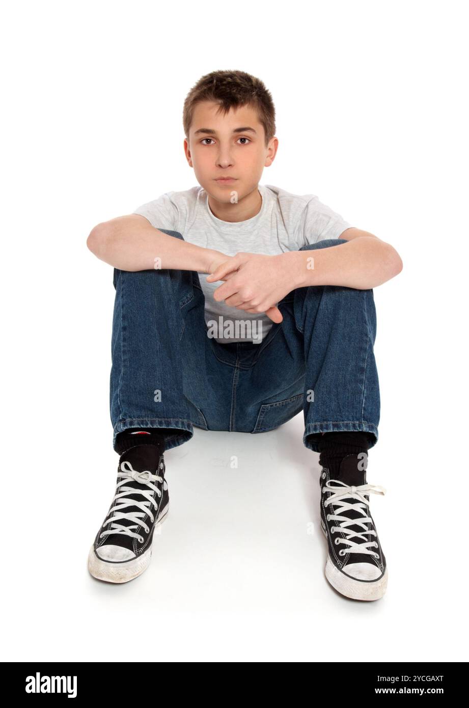 Teen boy in white Cut Out Stock Images & Pictures - Alamy