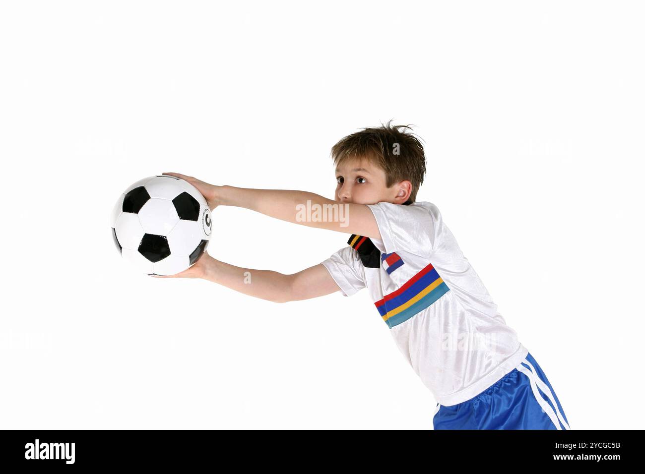 Holding soccer ball boy Cut Out Stock Images & Pictures - Alamy