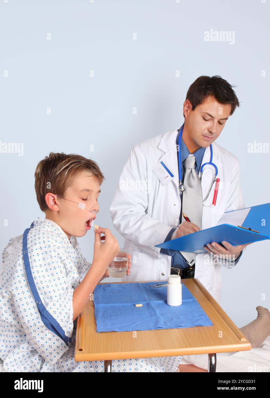 Child taking doctor medication Stock Photo - Alamy