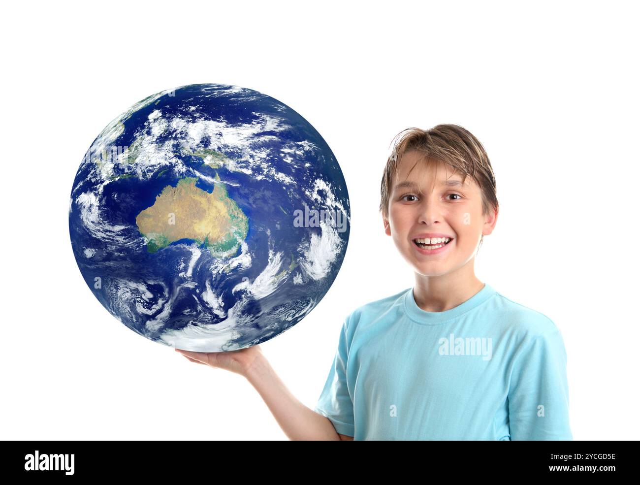 Smiling child holding our world planet showing Australia Oceania Stock ...