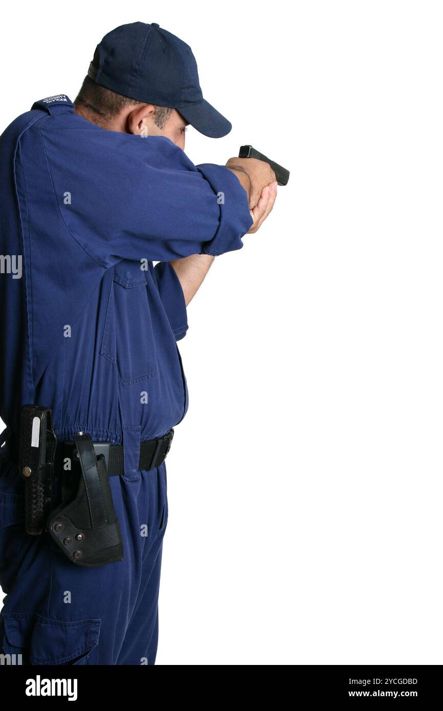 Security Officer aiming a gun Stock Photo - Alamy