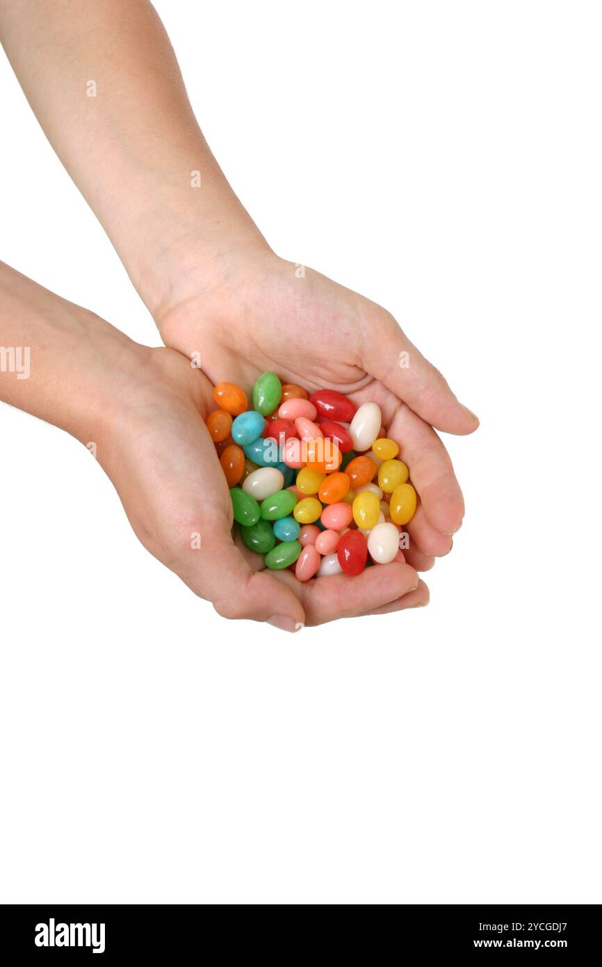 Handful of candy hi-res stock photography and images - Alamy