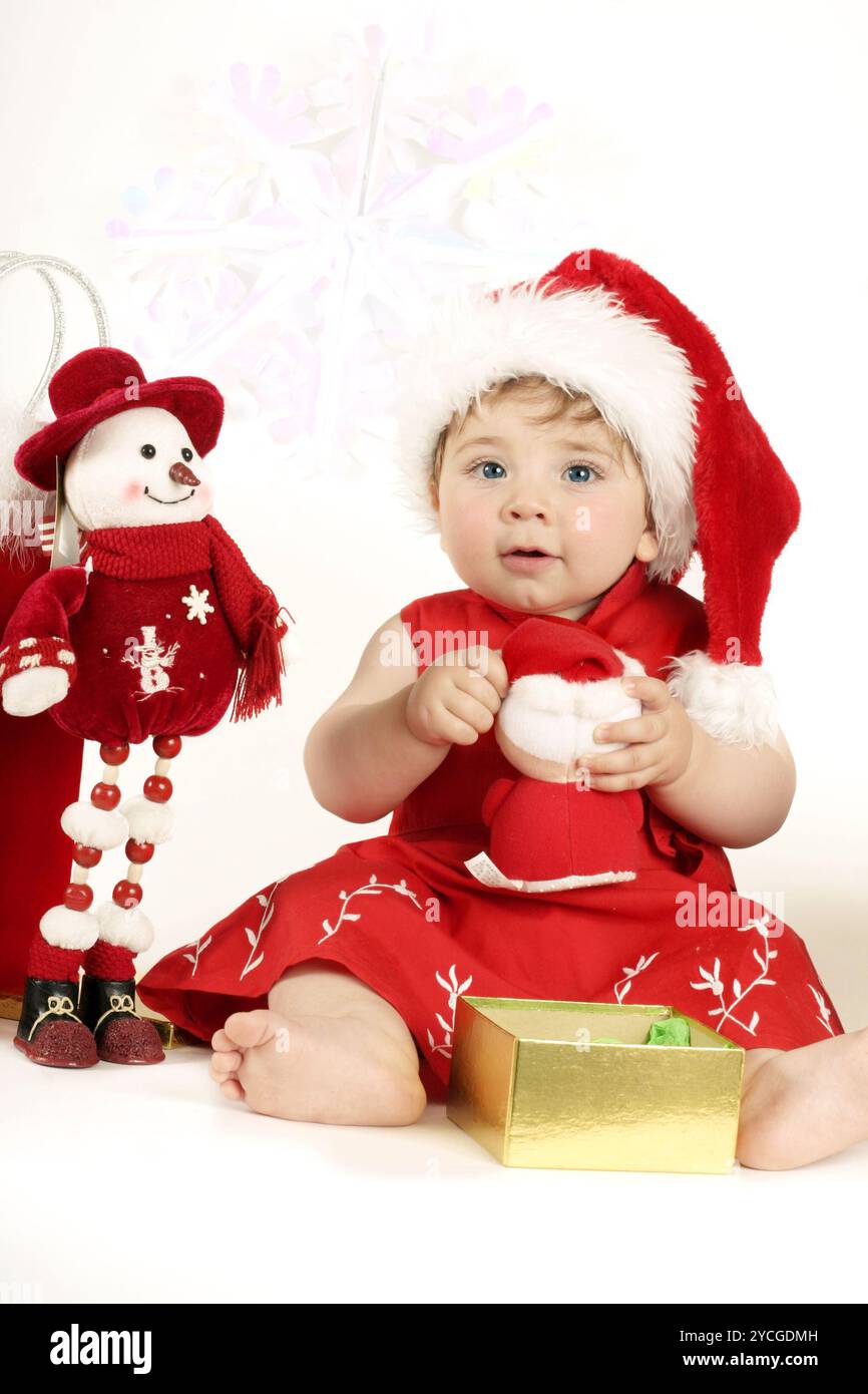 Christmas child playing Stock Photo - Alamy