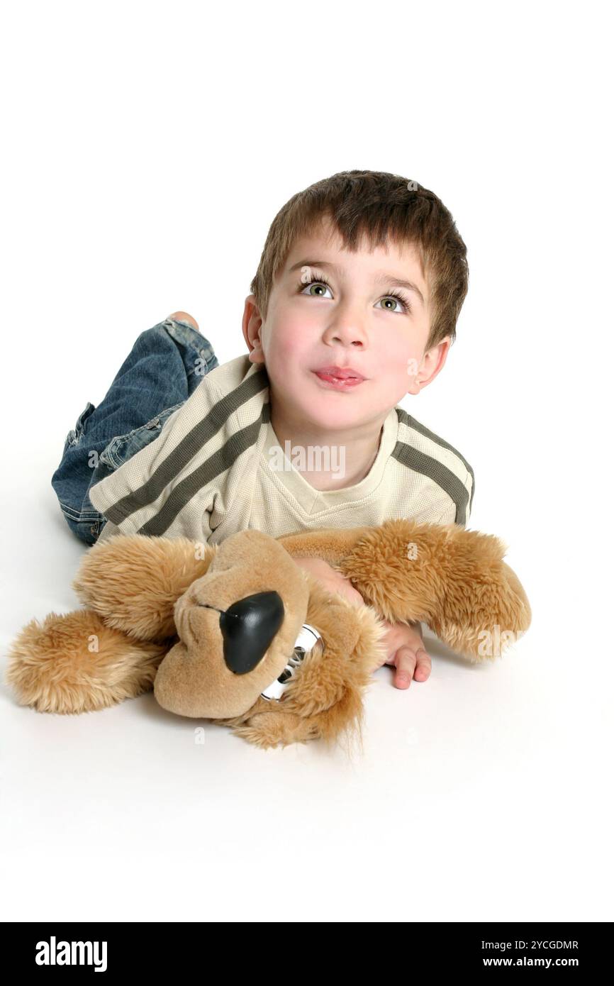 Boy dog playing Cut Out Stock Images & Pictures - Alamy