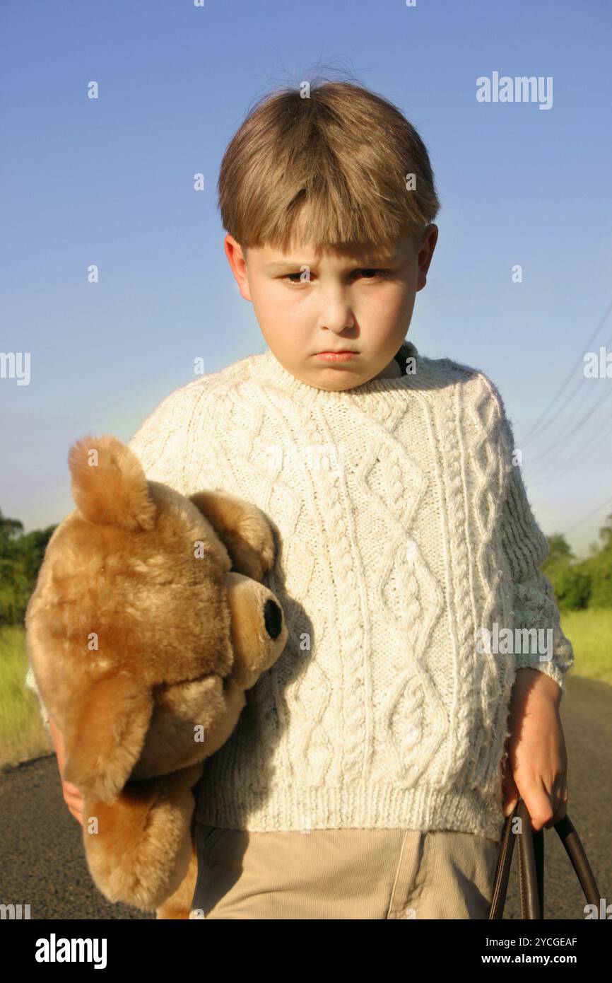 Boy and Teddy Stock Photo - Alamy