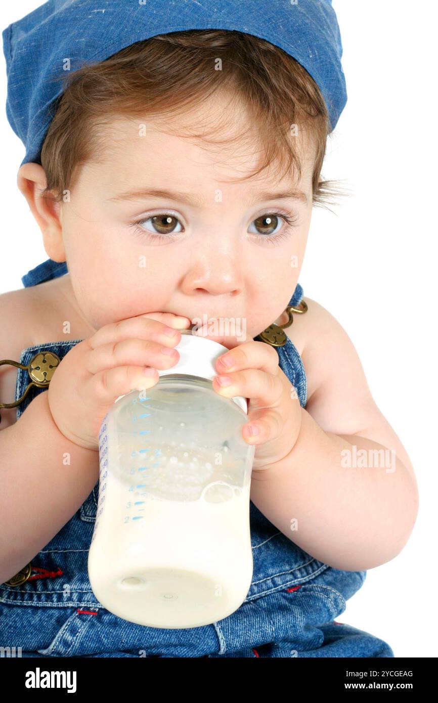 Baby with milk bottle Stock Photo - Alamy