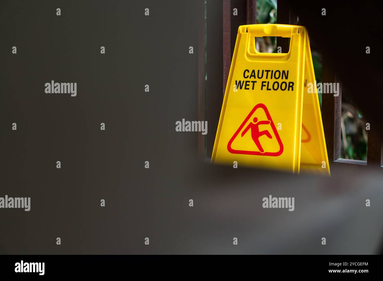 Yellow warning sign features hi-res stock photography and images - Alamy
