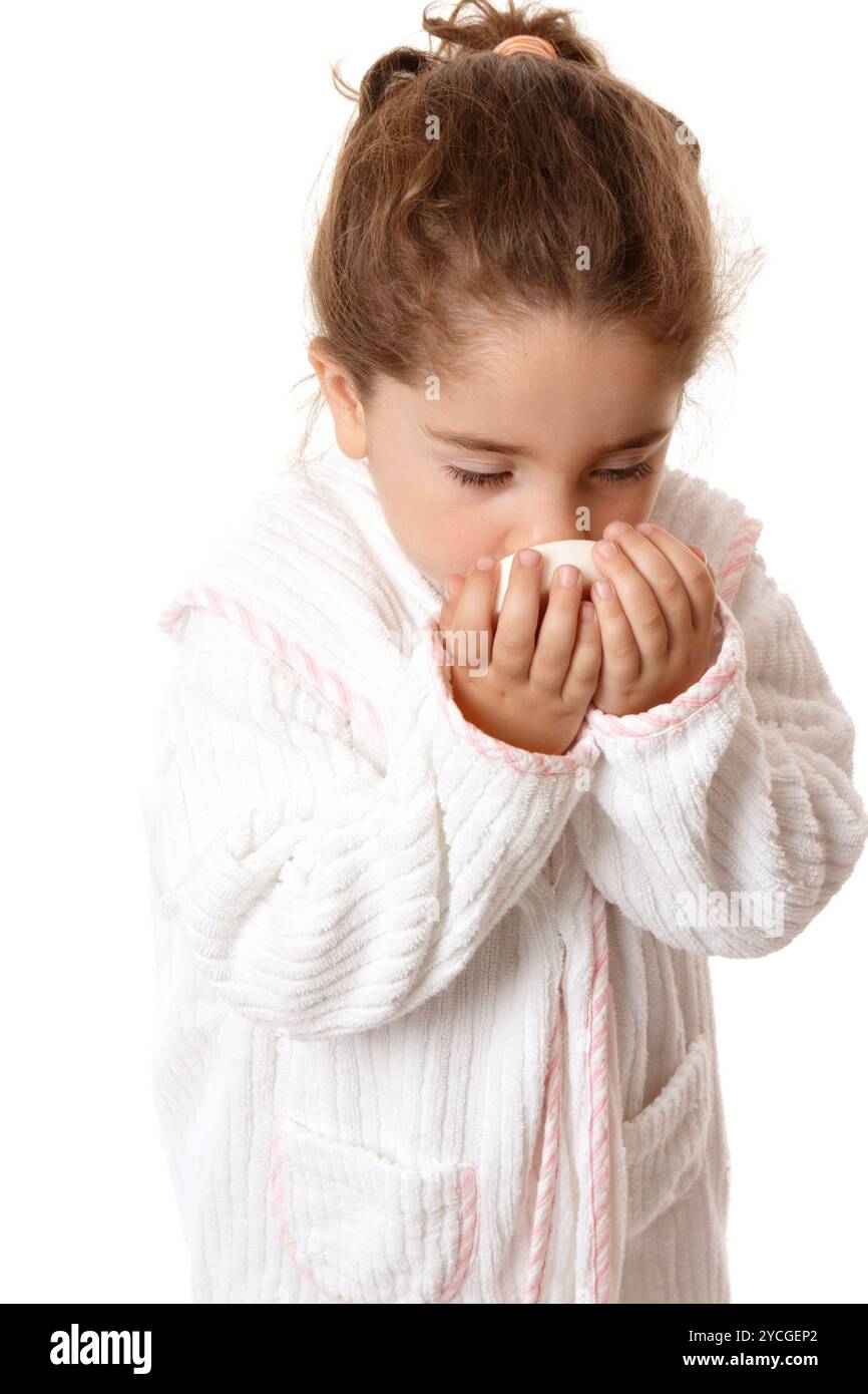 Little girl sniffing fragrant soap Stock Photo - Alamy