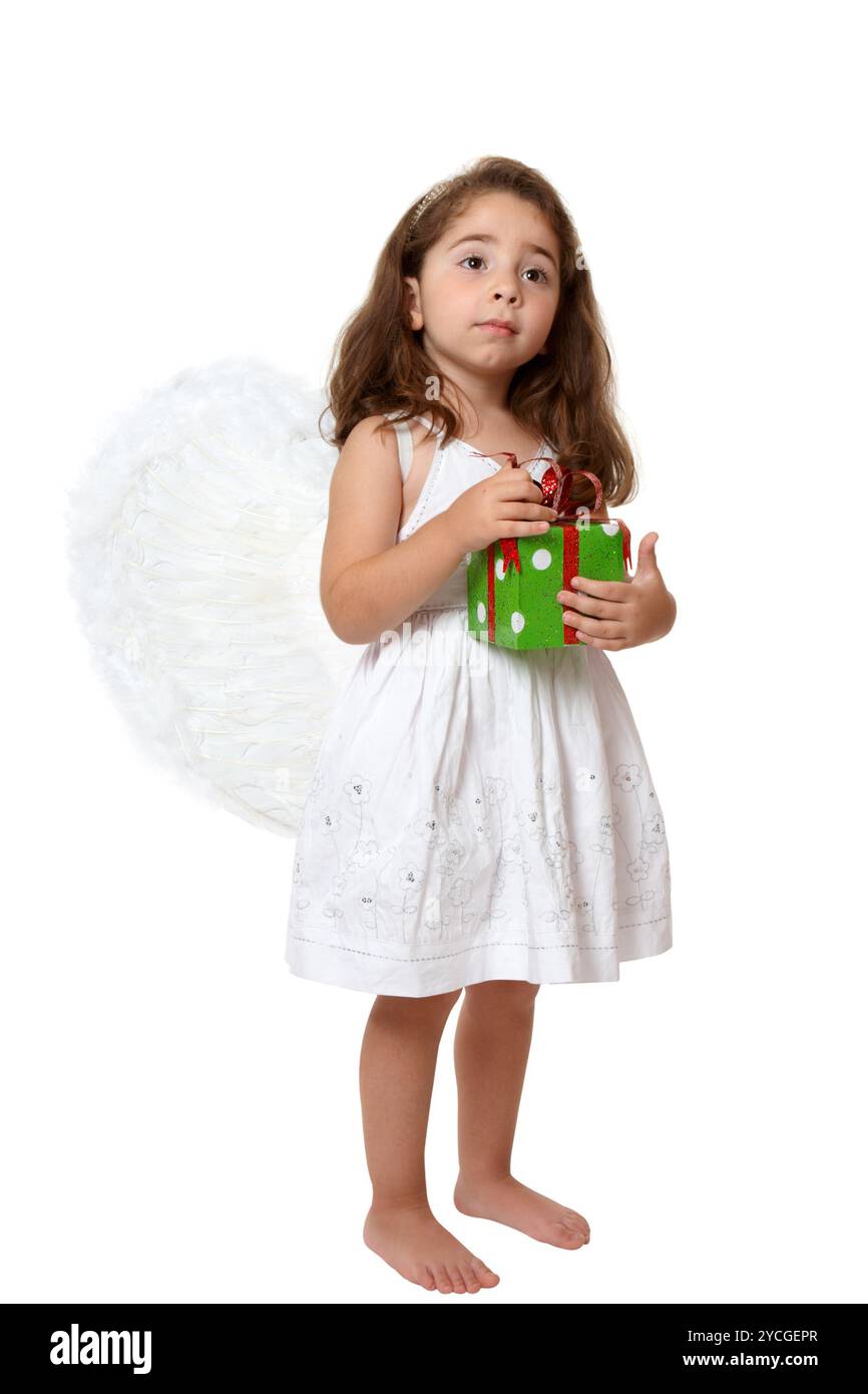 Angel child holding a present Stock Photo - Alamy