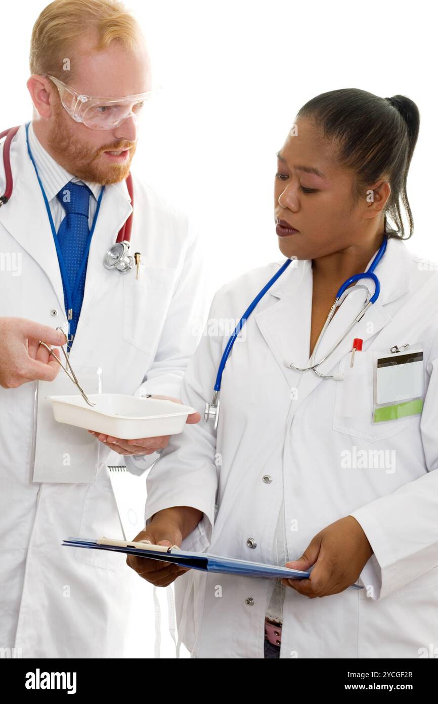 Diverse group doctors in discussion hi-res stock photography and images ...
