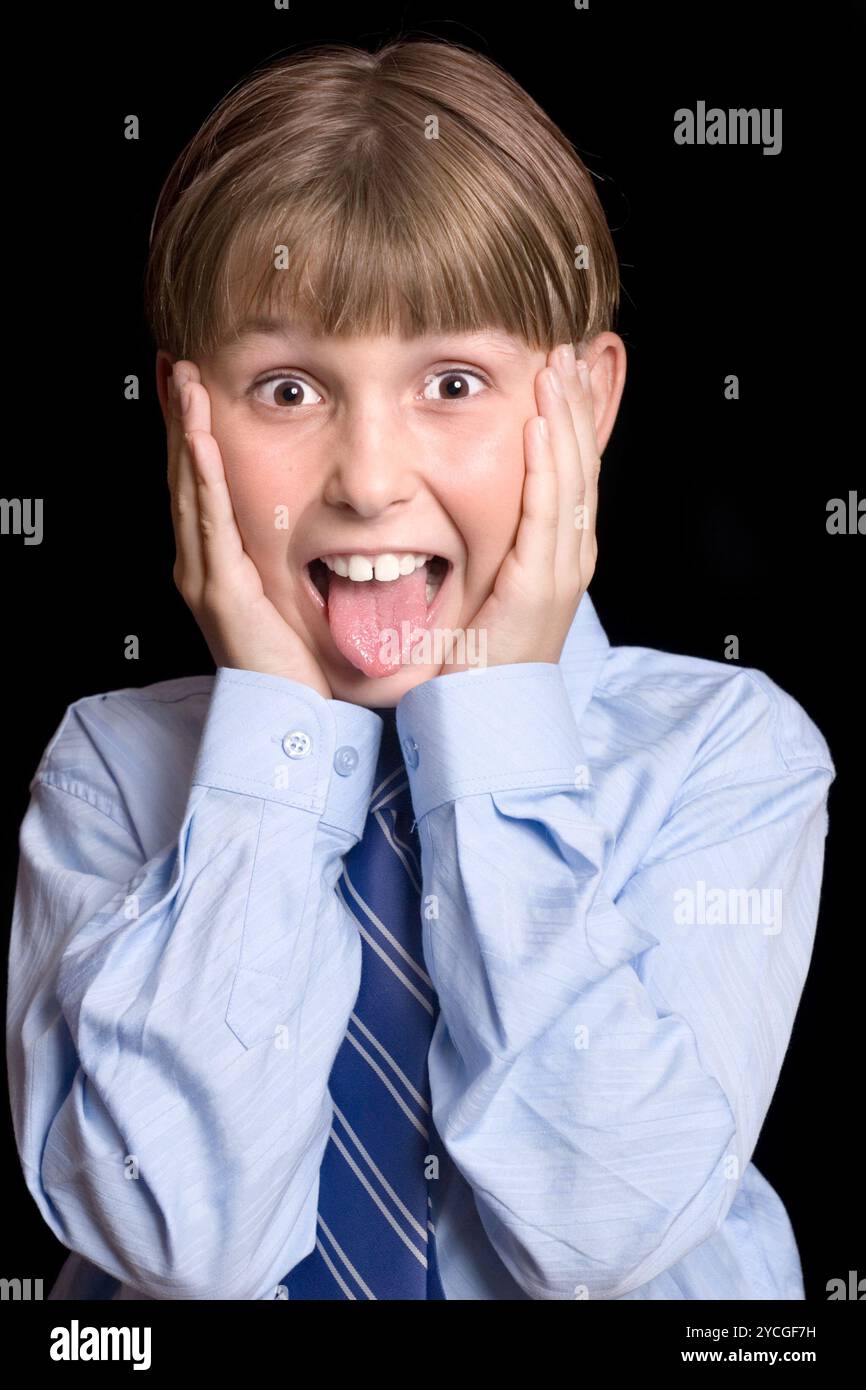 Boy hands to face expression Stock Photo - Alamy