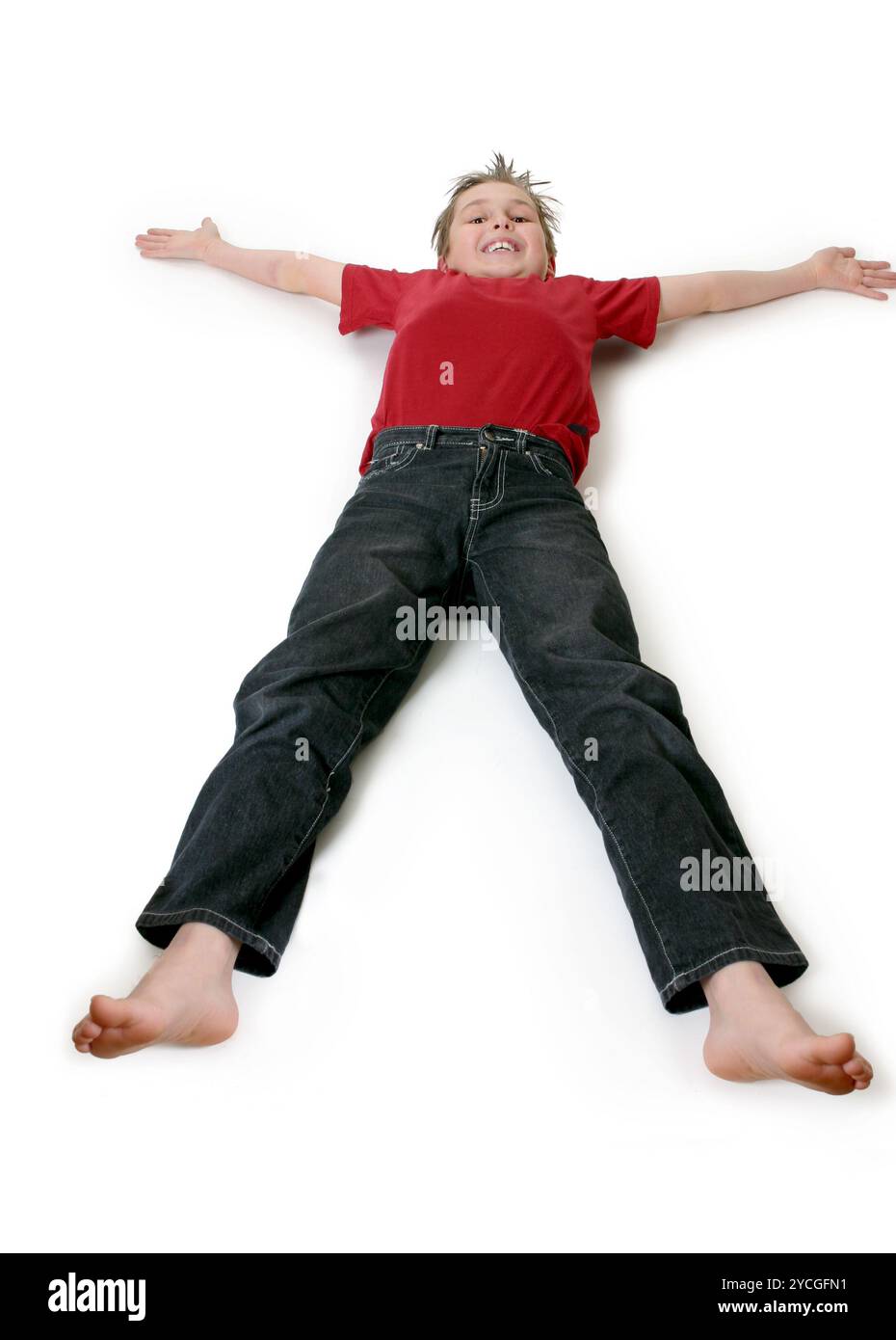 Boy lying down Stock Photo - Alamy