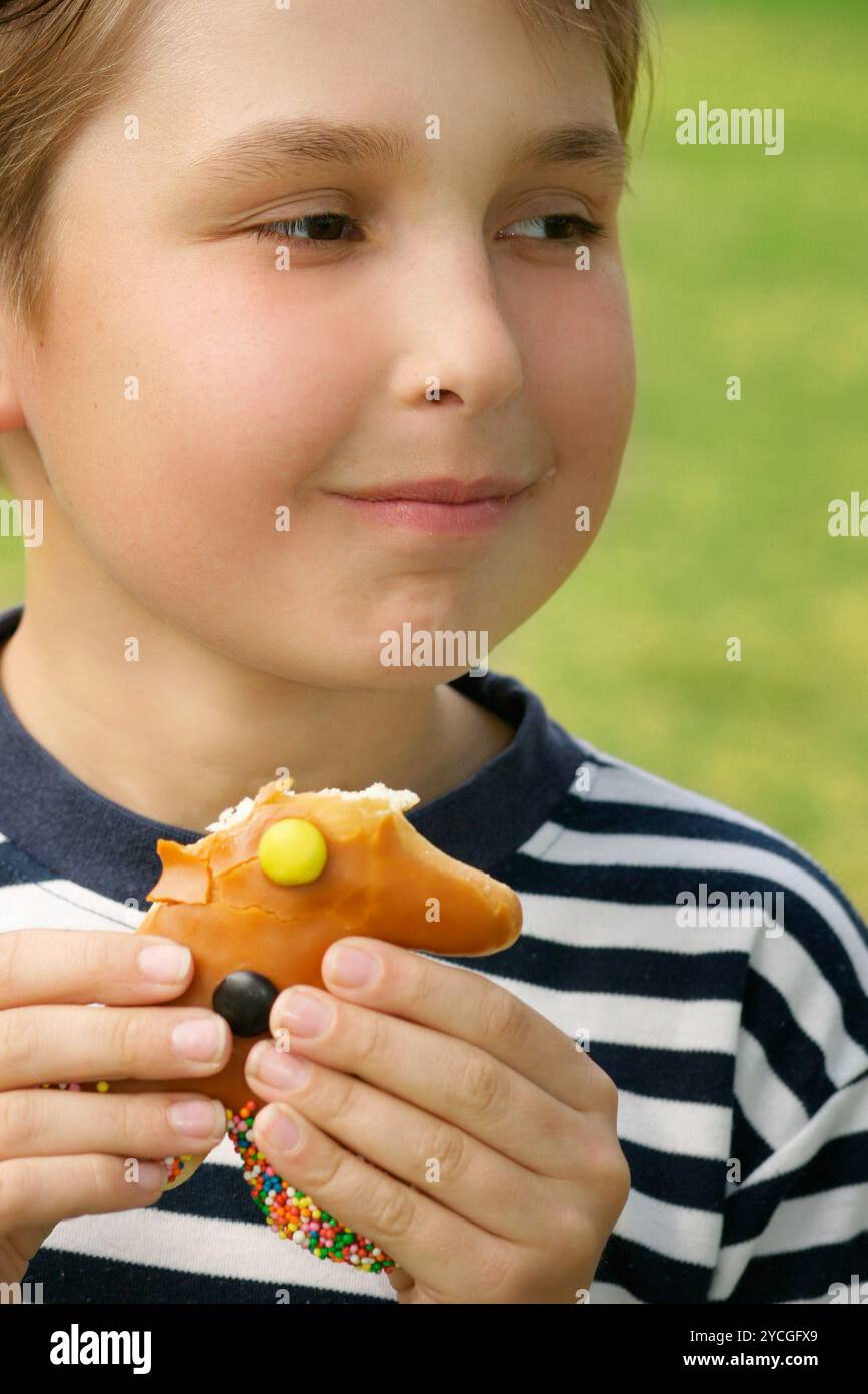 Boy with a sweet treat Stock Photo - Alamy