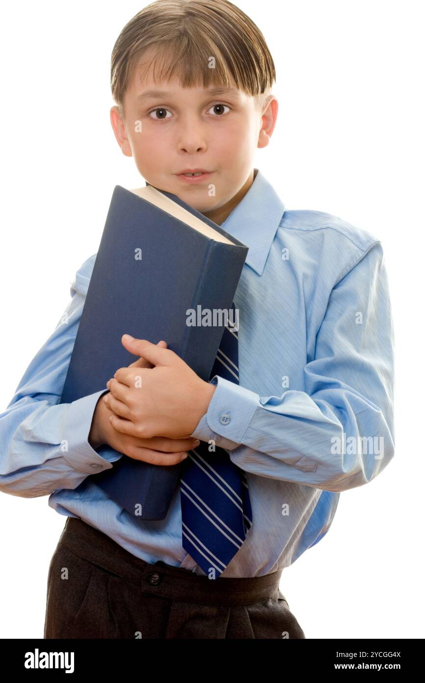 School boy student carrying book Stock Photo - Alamy
