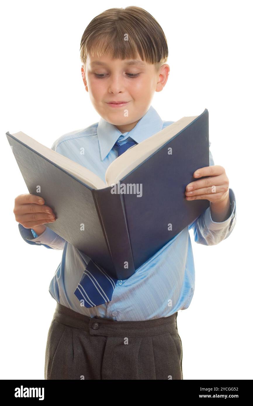 Student in uniform reading from a blue book textbook. White background ...