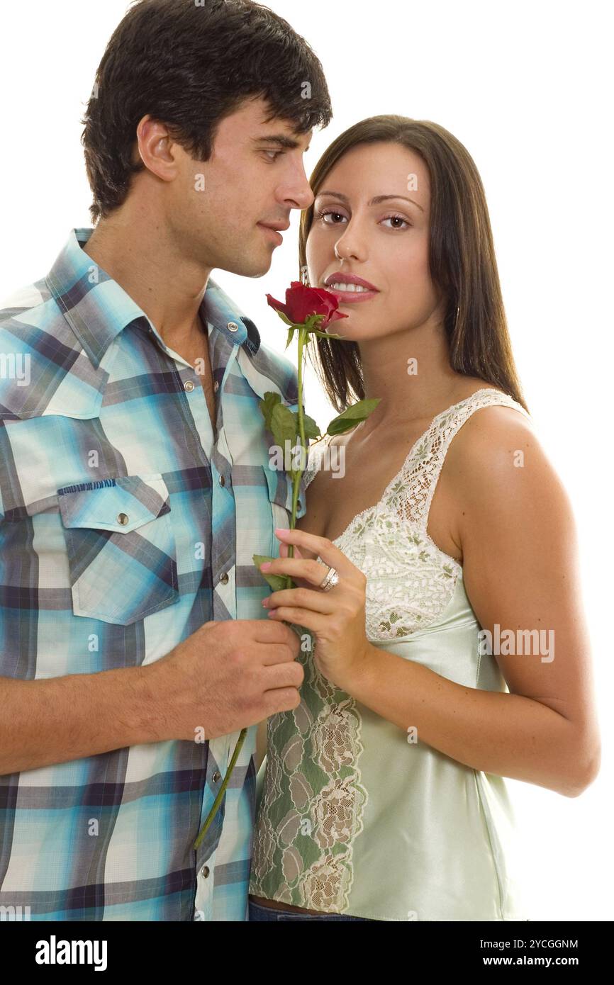 Man Woman holding single red rose Stock Photo - Alamy