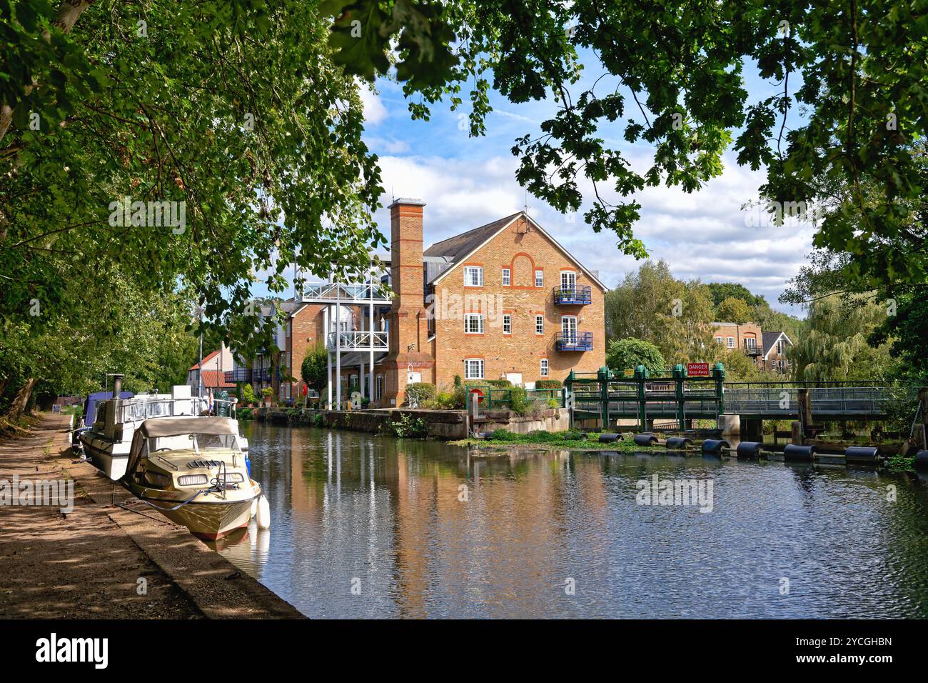 Modern apartments on the waterside on the River Wey Navigation canal by ...