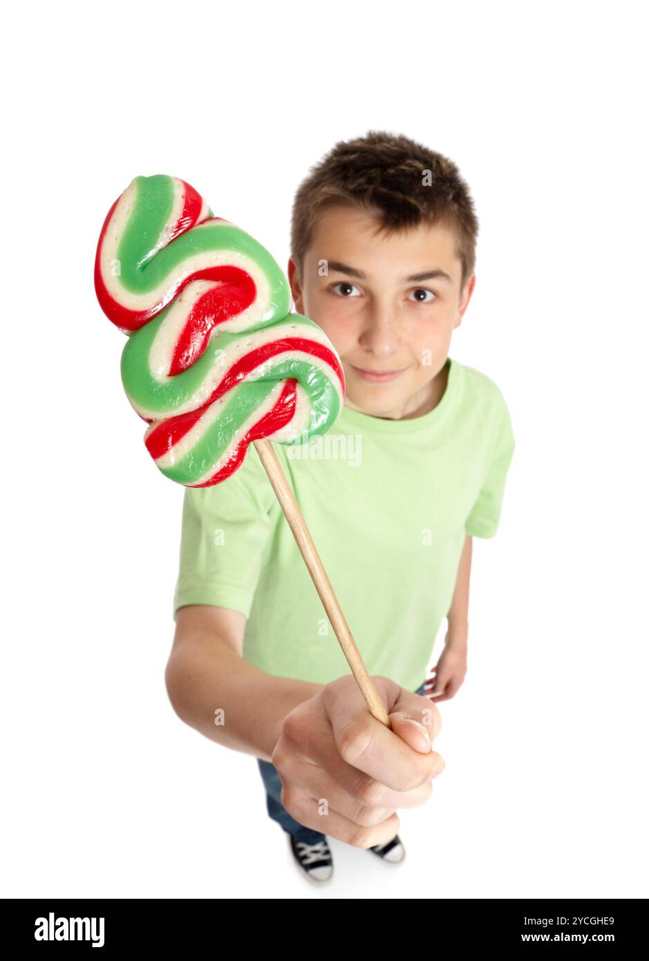 Boy showing lollipop candy Stock Photo - Alamy