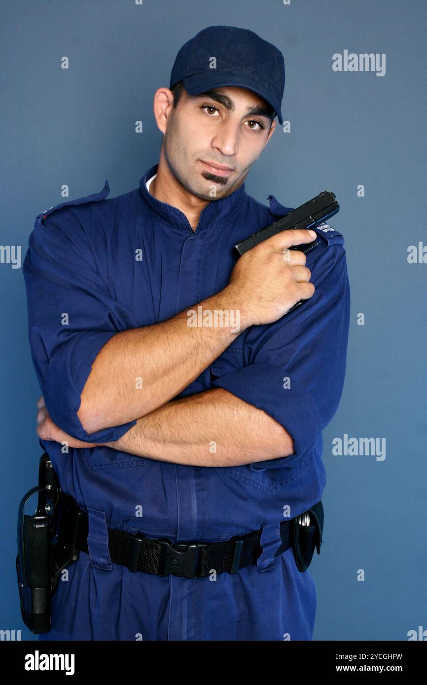 Standing uniform security guard authority hi-res stock photography and ...