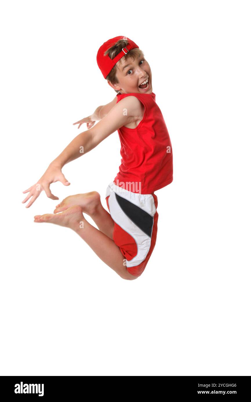 Happy boy mid jump Stock Photo - Alamy