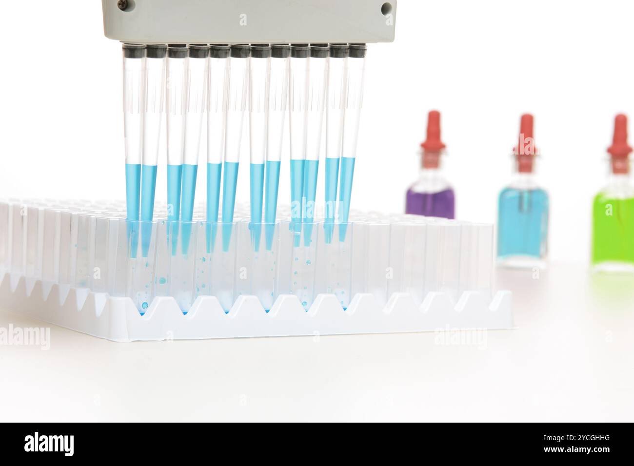 Scientist using pipette in research Stock Photo - Alamy